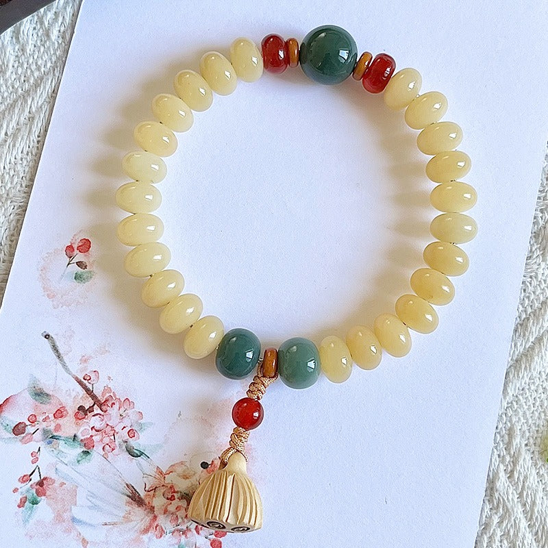 Cream-Toned White Jade Bodhi Bracelet with Boxwood Lotus Pod – Availab ...